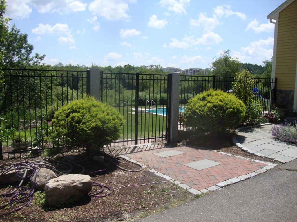 Aluminum conqueror style double drive gate with 8x8 granite terminal ...