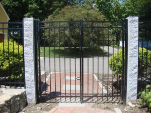 Aluminum conqueror style double gate with 8x8 granite terminal posts (2 ...